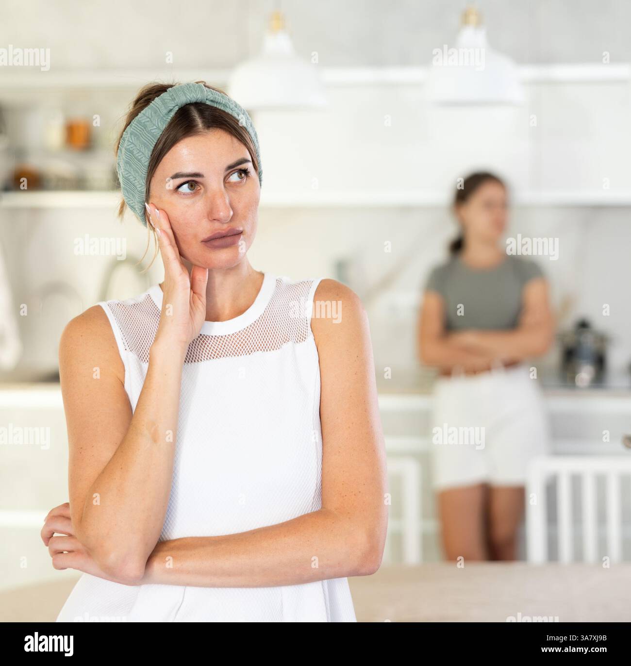 Domestic quarrel - two sisters have quarreled, and they are talking to ...
