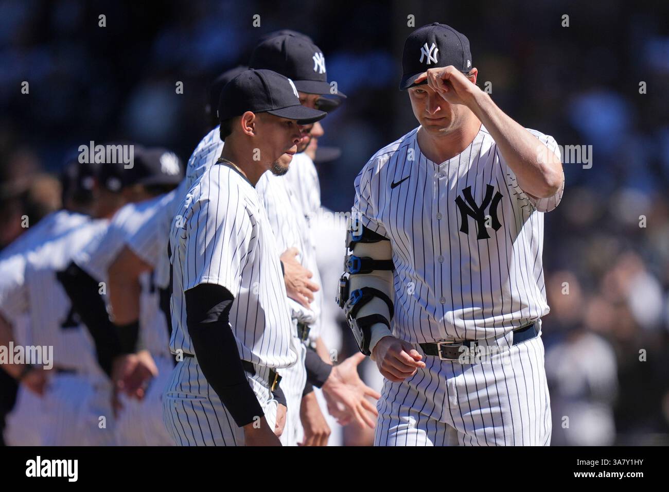 New York Yankees Gerrit Cole greets teammates before the start of an ...