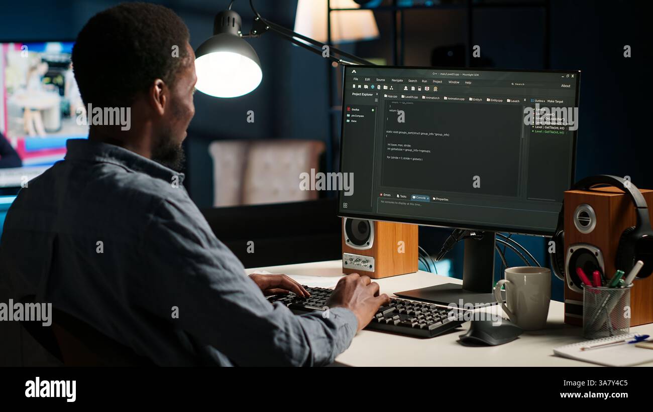 Black man programmer manages code hi-res stock photography and images ...