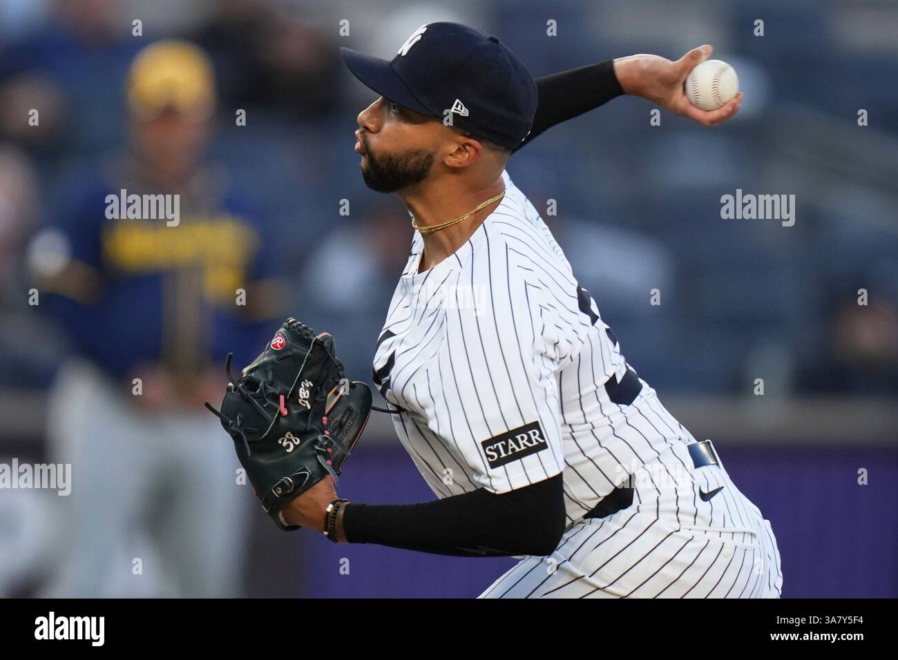 New York Yankees pitcher Devin Williams throws during the ninth inning ...
