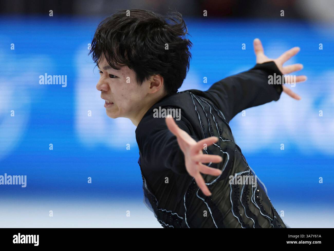 Yuma KAGIYAMA of Japan performs during the men's short program at the ...