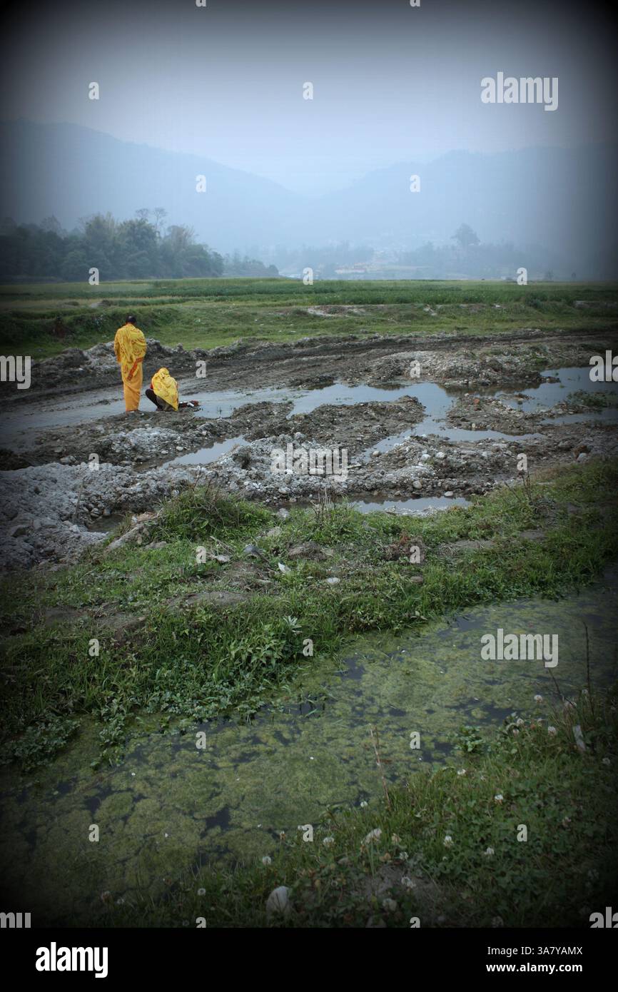 April 8, 2010 - Sundarijal, Nepal - Hindu worshippers offering prayer ...
