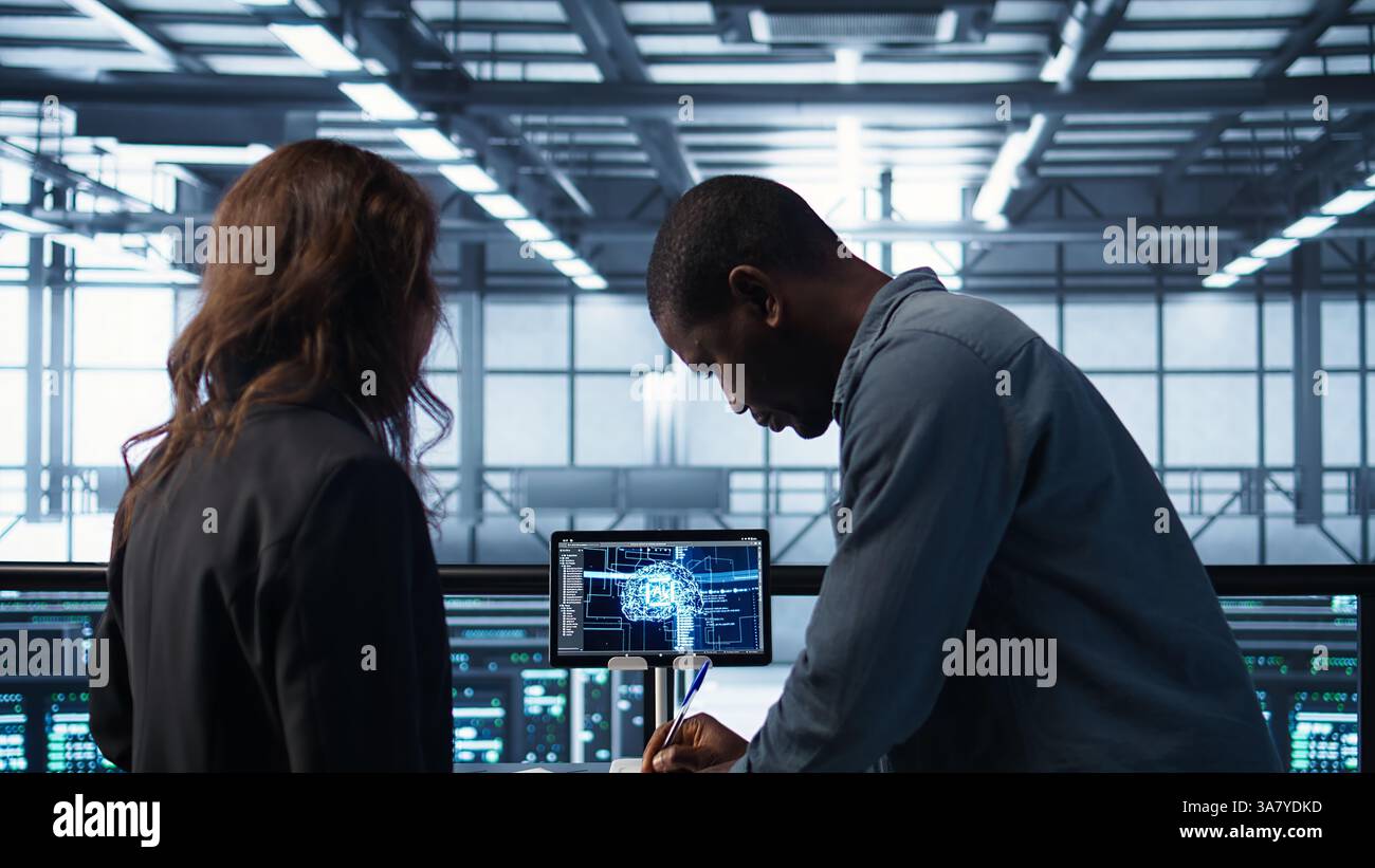 Manager meeting with client in data center using artificial ...