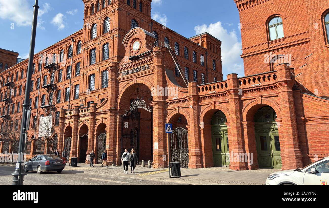 Brick entrance gate to Izrael Poznanski cotton factory building with ...