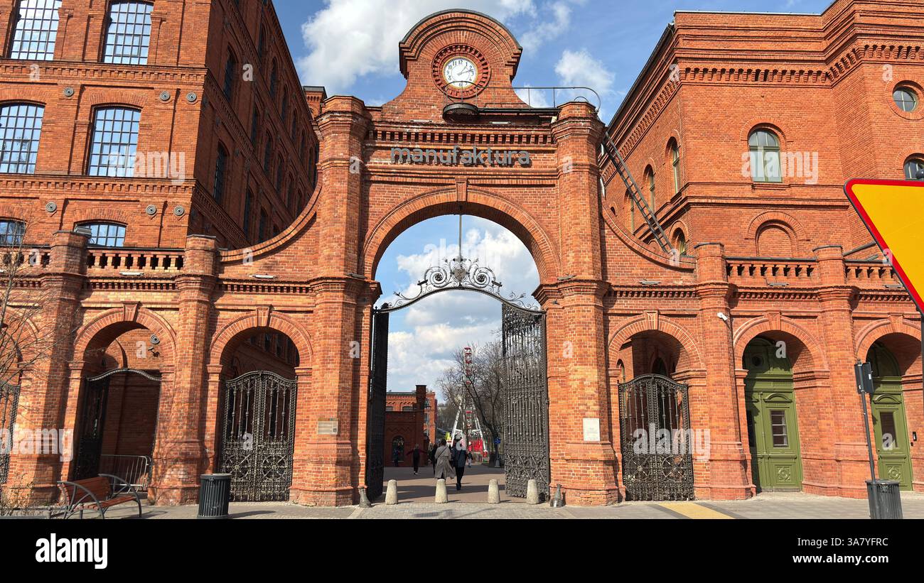 Brick entrance gate to Izrael Poznanski cotton factory building with ...