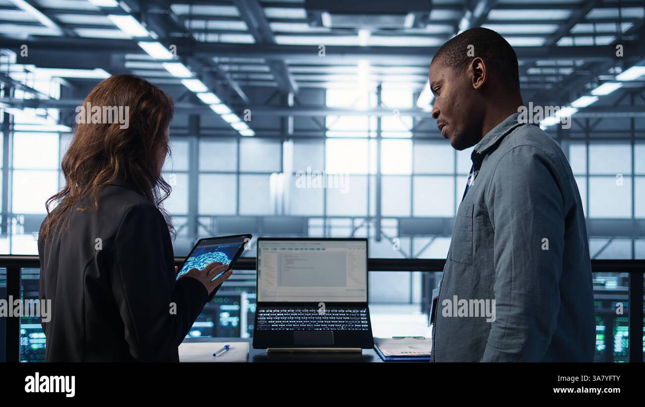 Programmers Using Ai Technology On Laptop And Tablet In Data Center Employing Machine Learning