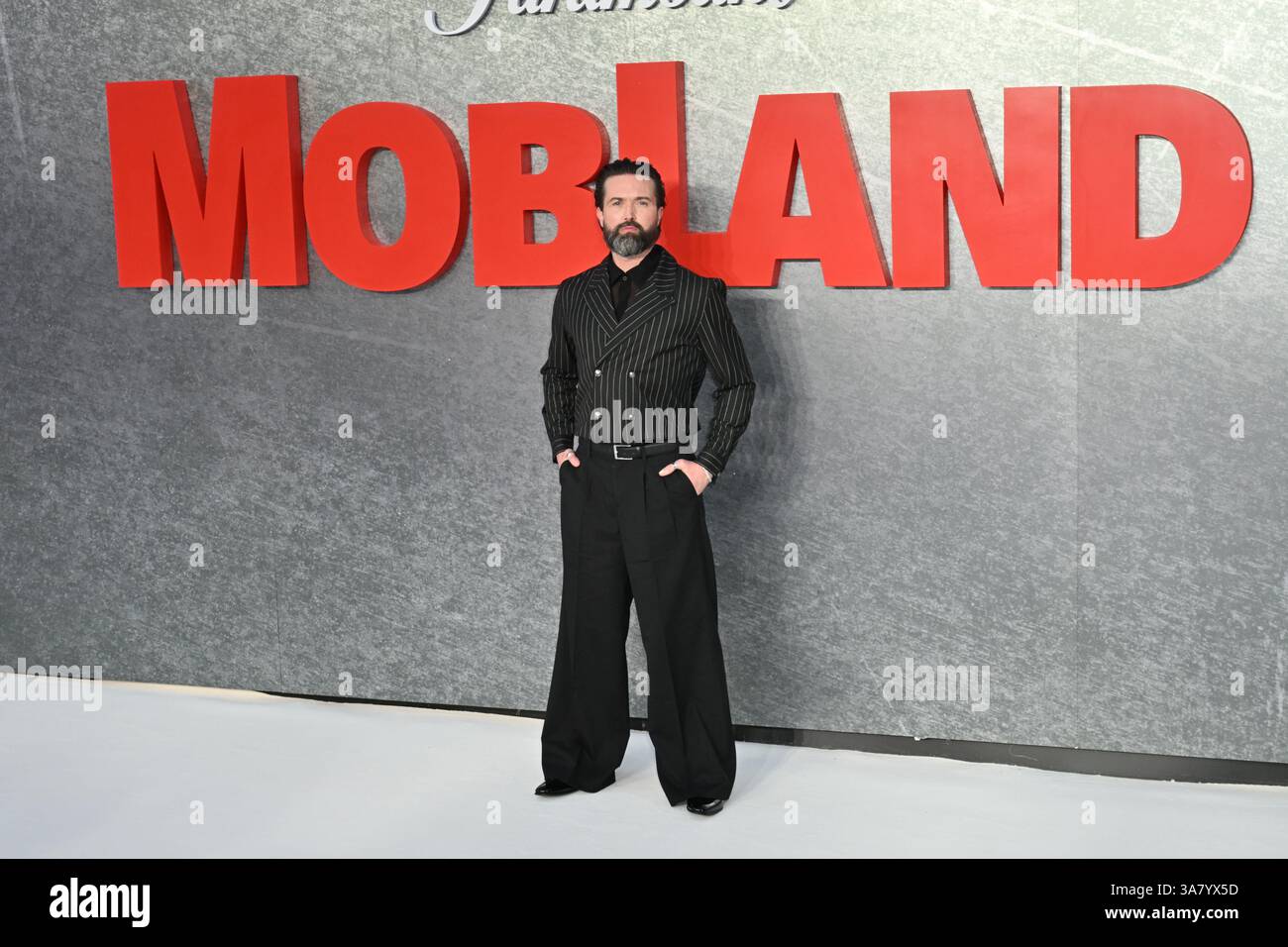 London, UK. 27th Mar, 2025. Emmett J. Scanlan at UK premiere of MobLand ...