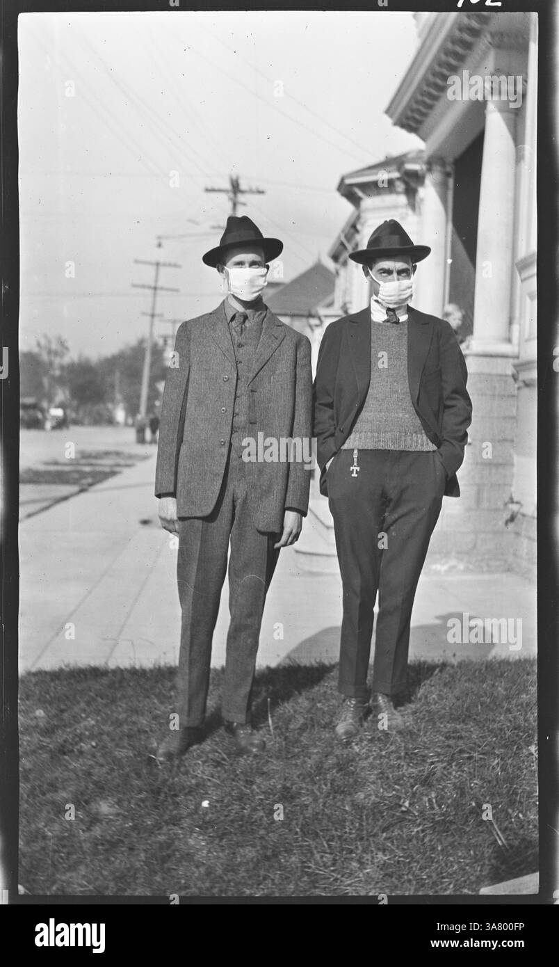 Two men wearing masks 1918 Stock Photo - Alamy