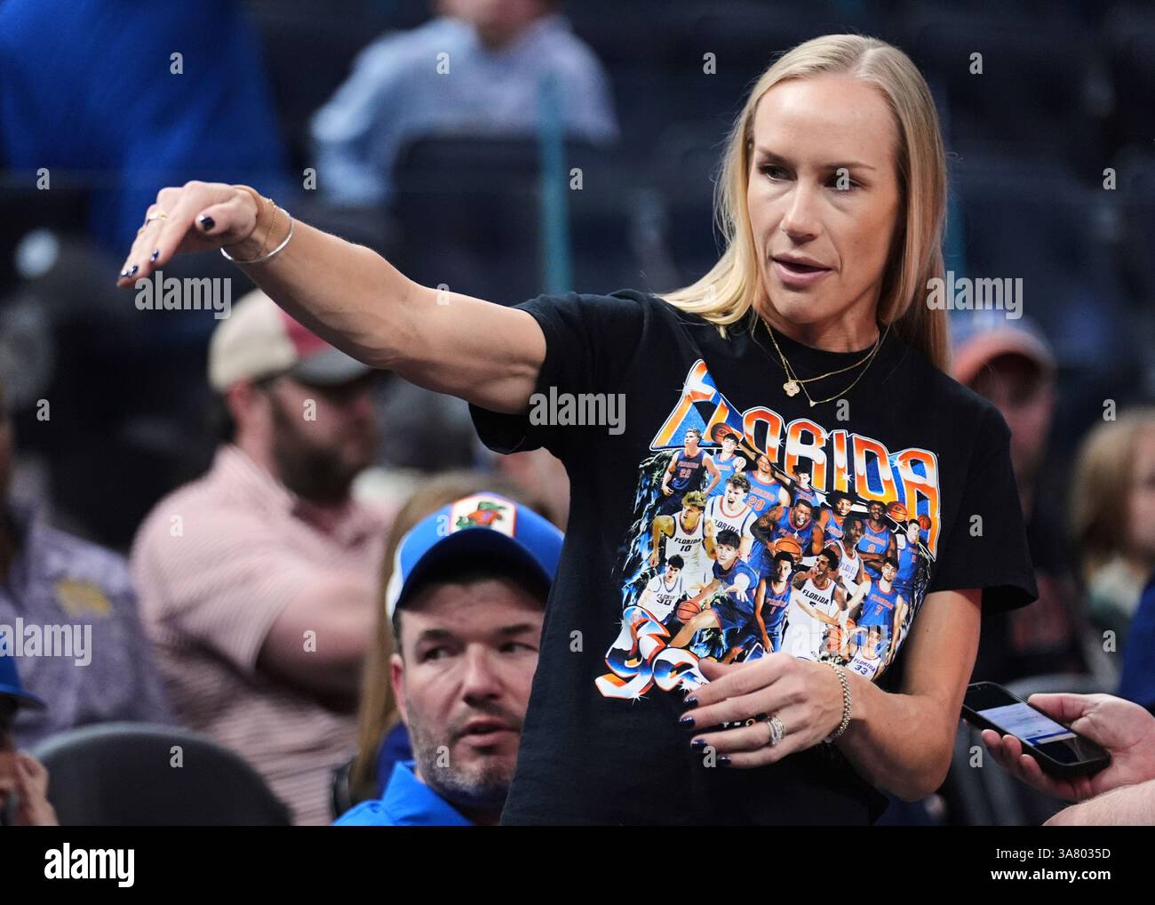 Megan Golden, wife of Florida head coach Todd Golden, watches before ...