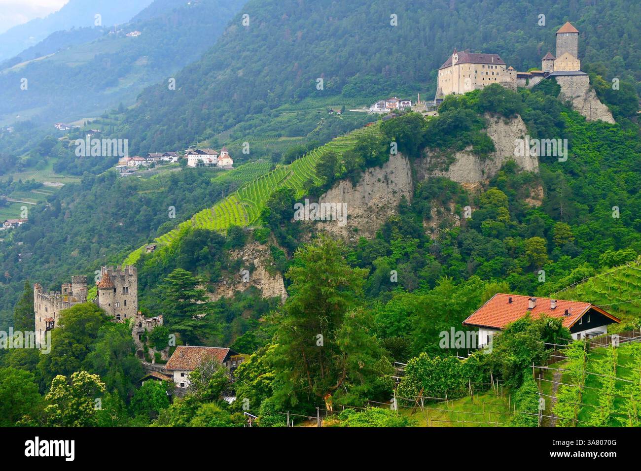 Idyllic scene with ancient medieval castles on a glacial moraine and ...