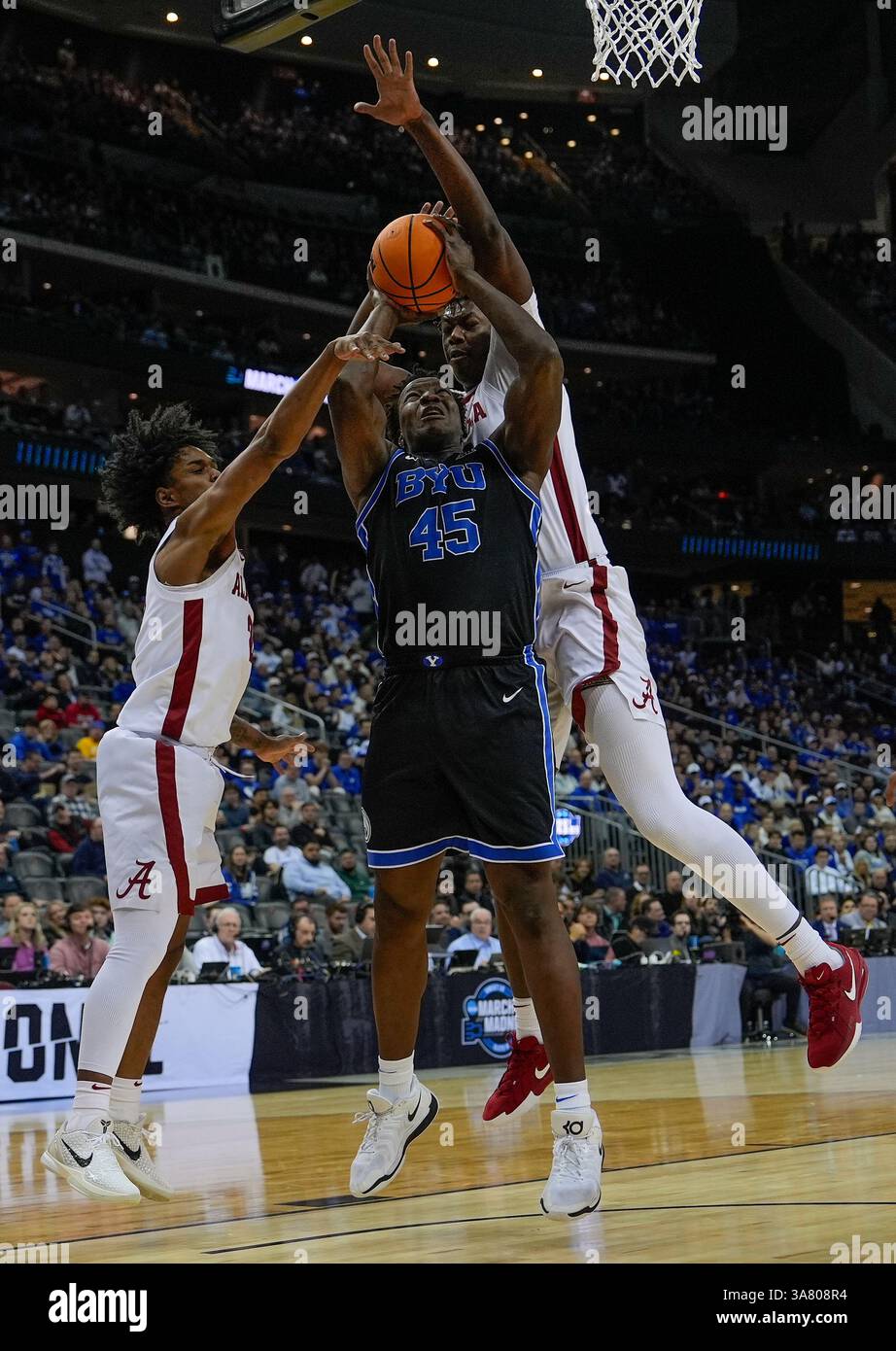 Brigham Young center Fousseyni Traore (45) puts up a shot against ...