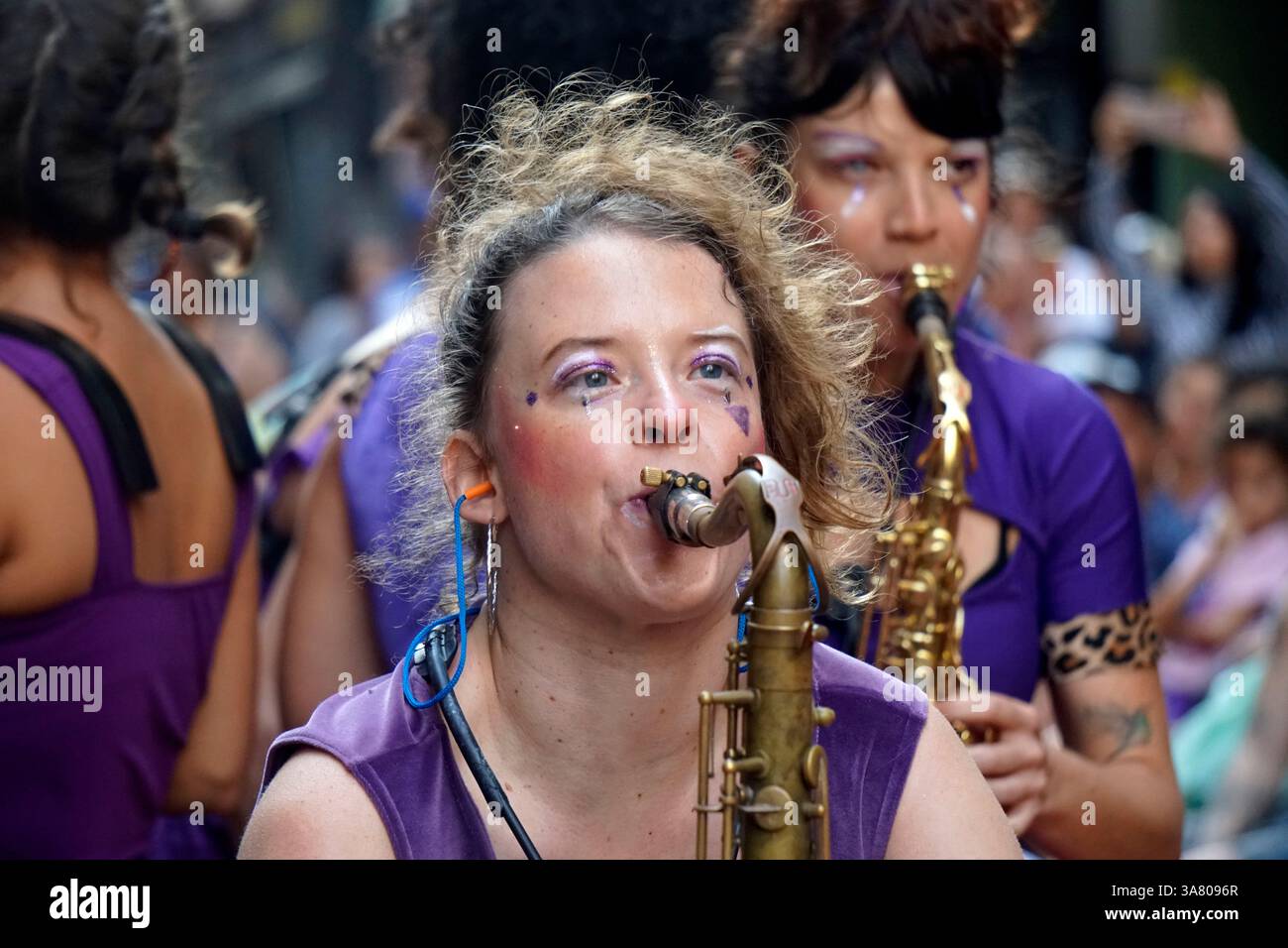 The artists participate in a parade as part of the celebration of ...