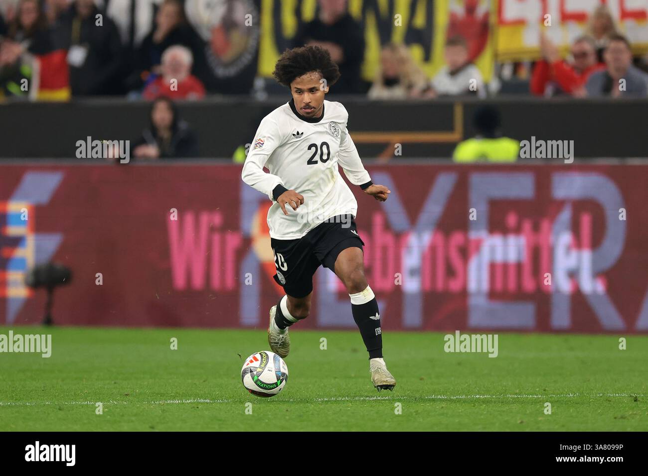 Dortmund, Germany, 23rd March 2025. Karim Adeyemi of Germany during the ...