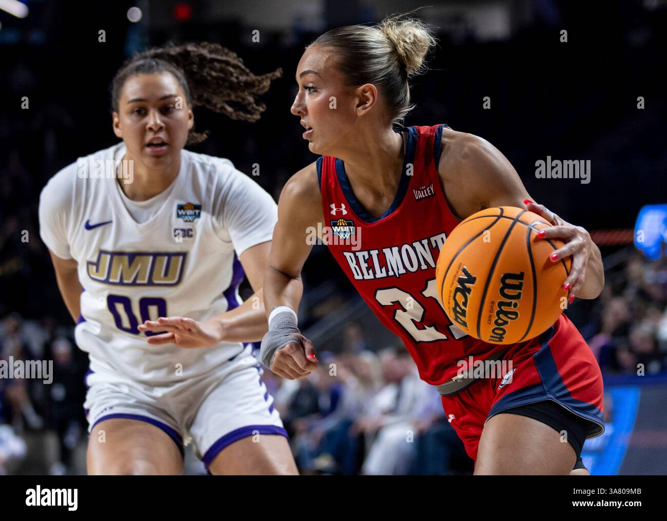 Belmont guard Emily La Chapell (21) drives around James Madison guard ...