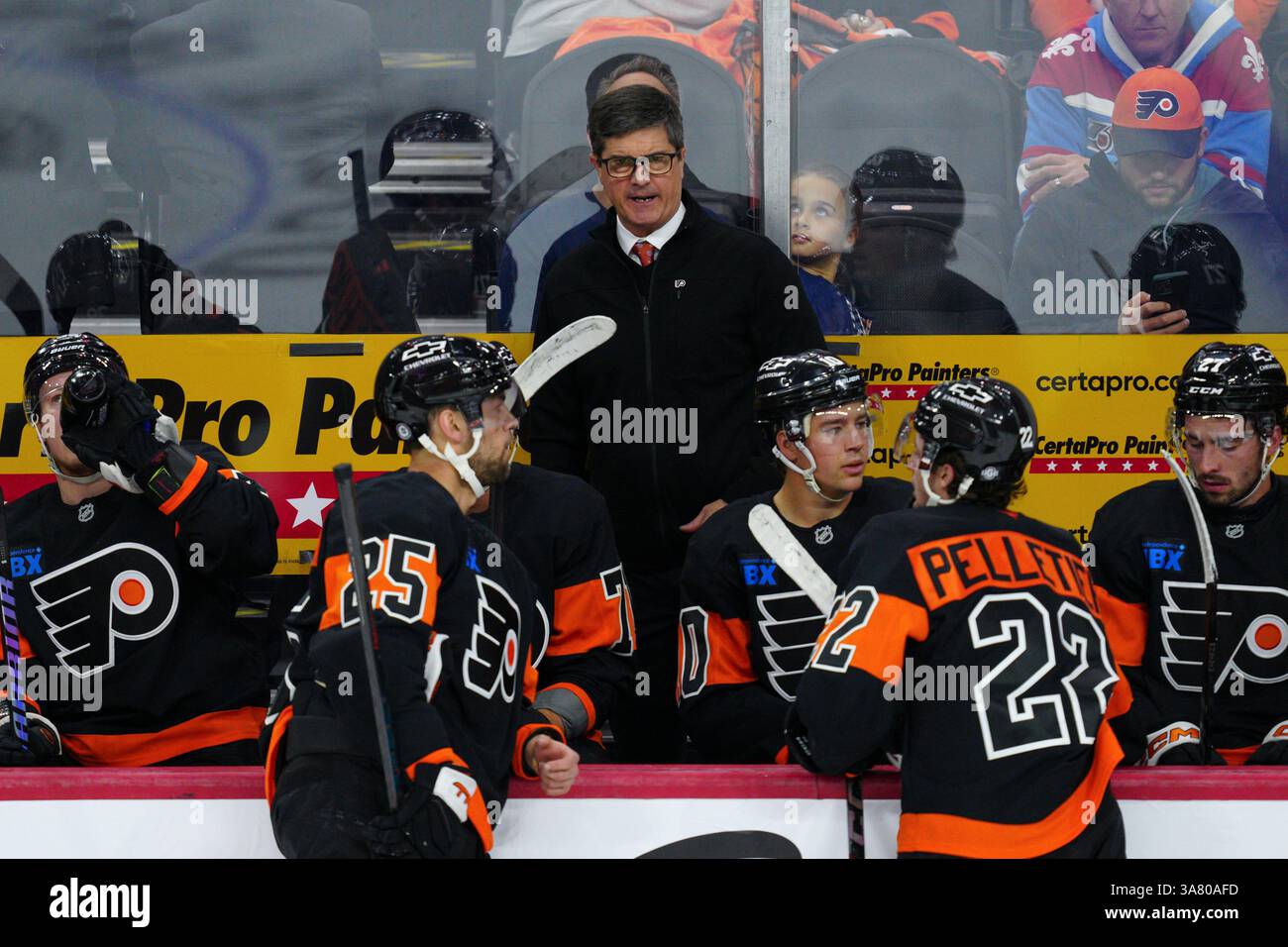 Philadelphia Flyers interim head coach Brad Shaw, center, talks to his ...