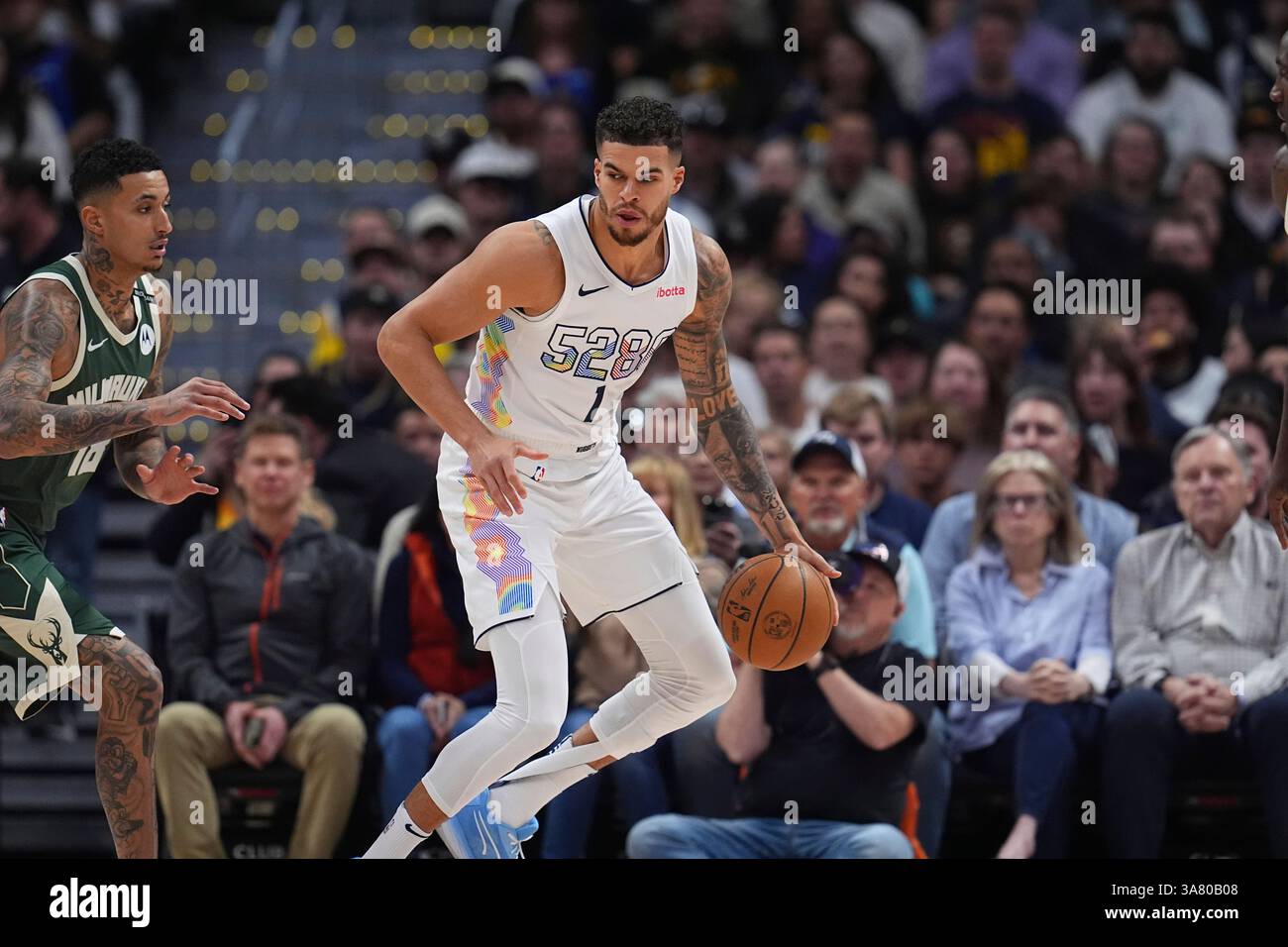 Denver Nuggets forward Michael Porter Jr. (1) and Milwaukee Bucks ...