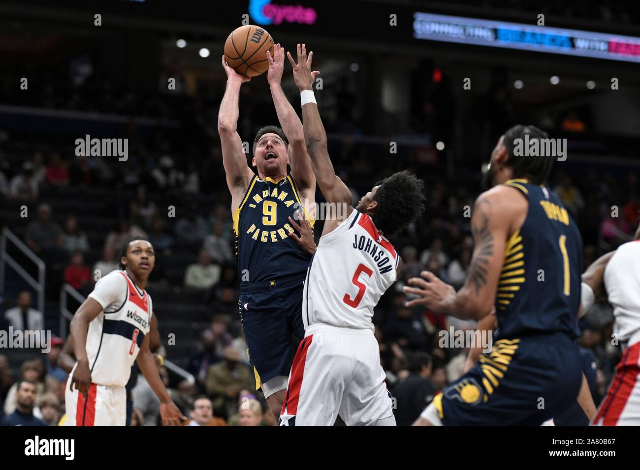 Indiana Pacers guard T.J. McConnell (9) shoots the ball over Washington ...