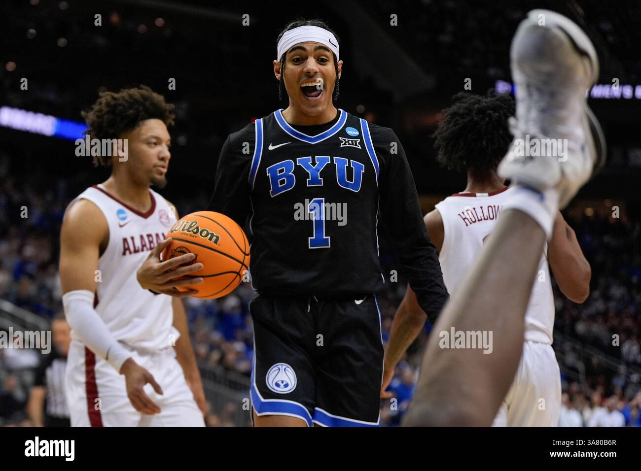 Brigham Young guard Trey Stewart (1) reacts during the first half of a ...