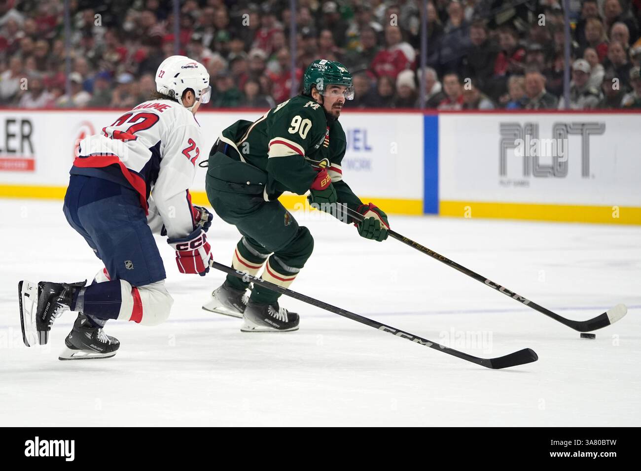 Minnesota Wild left wing Marcus Johansson (90) skates with the puck as ...