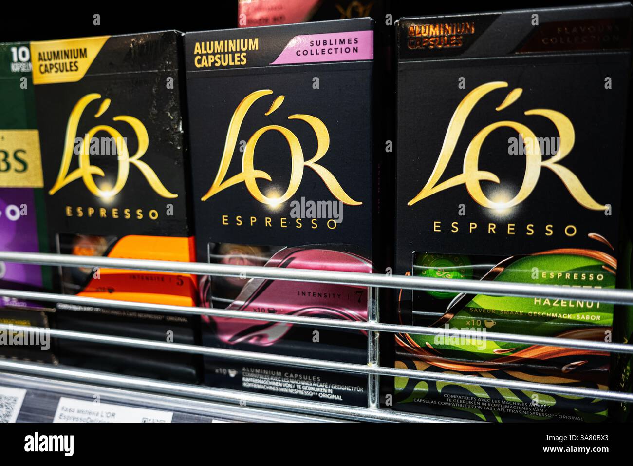 Lviv, Ukraine - March 25, 2025: Premium L'OR espresso coffee capsules ...