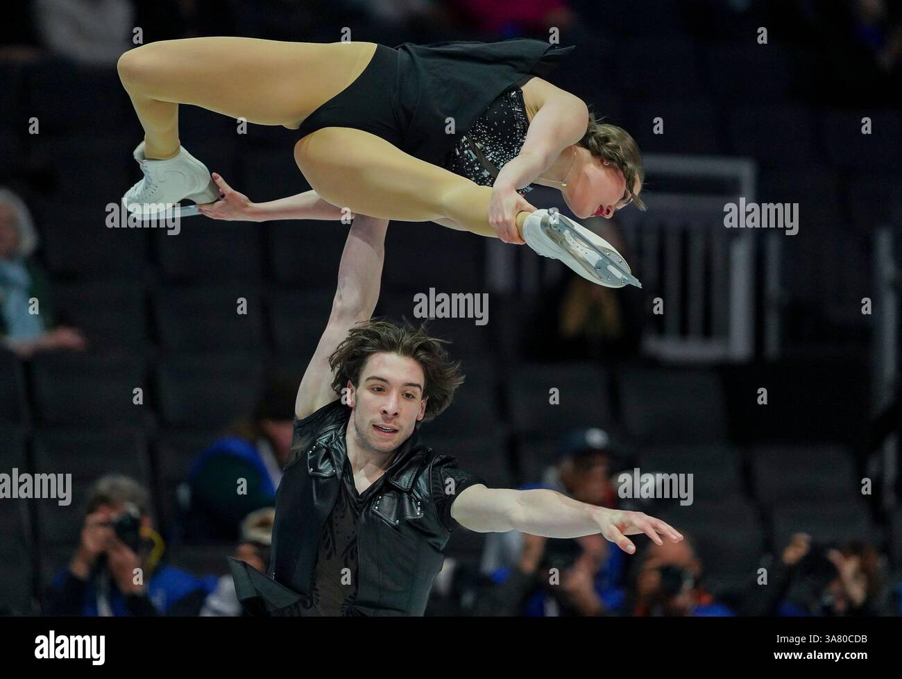 Kelly Ann Laurin and Loucas Ethier of Canada perform in the pairs free ...