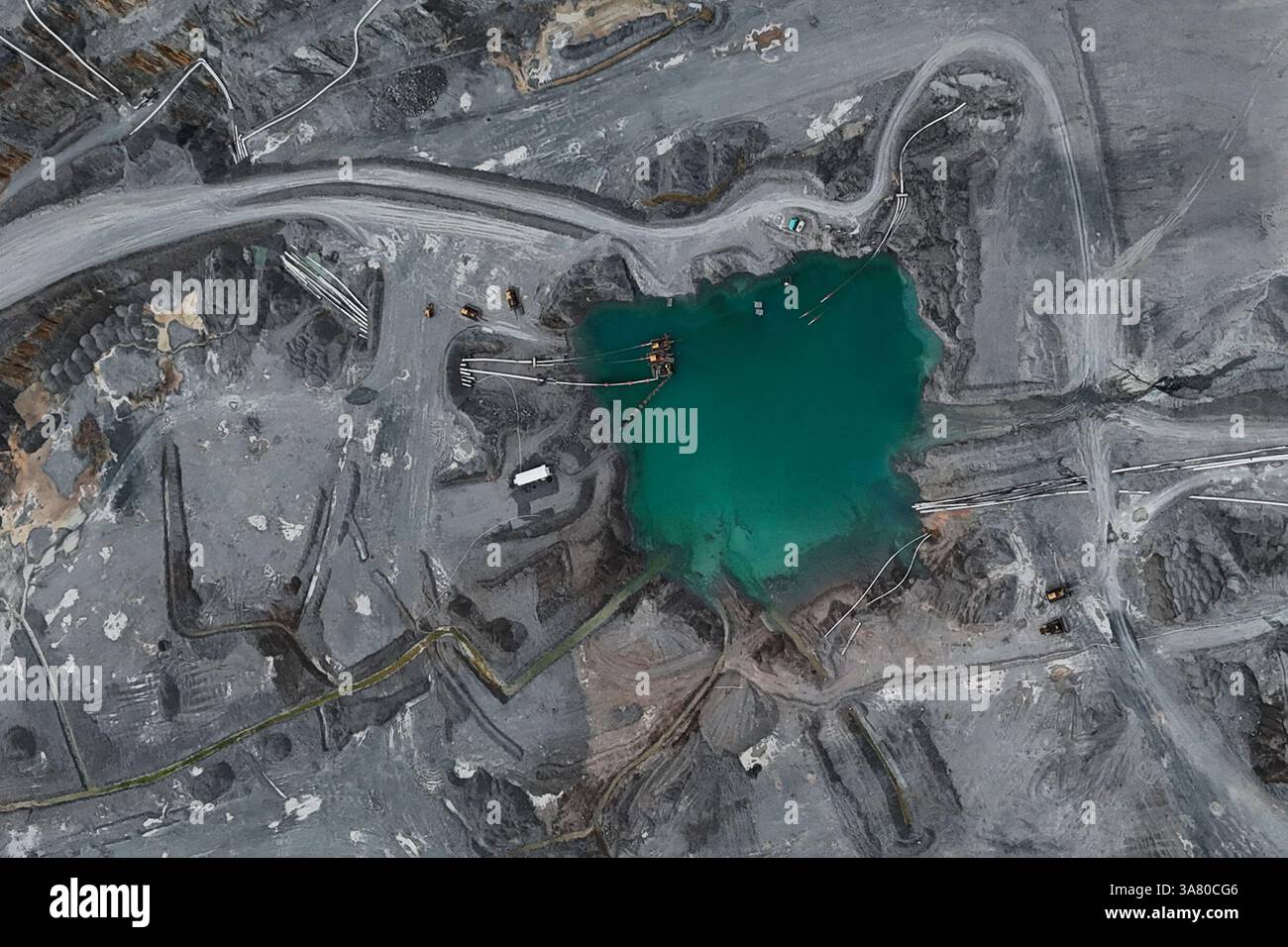 An aerial view of a sump at the Cobre Panama copper open-pit mine ...