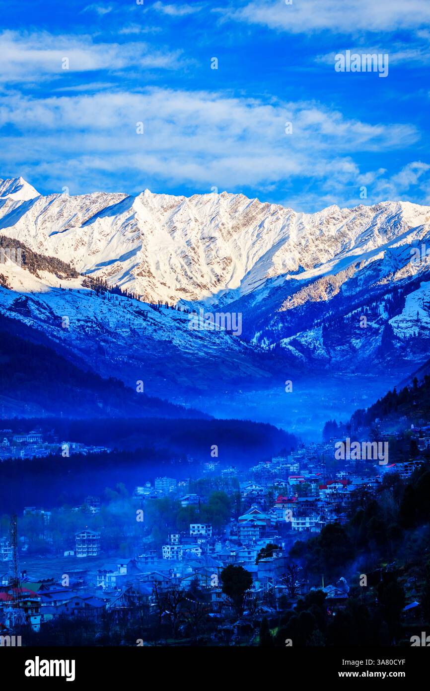 sunset in Manali overlooking Manali city and Himalayas India Stock ...