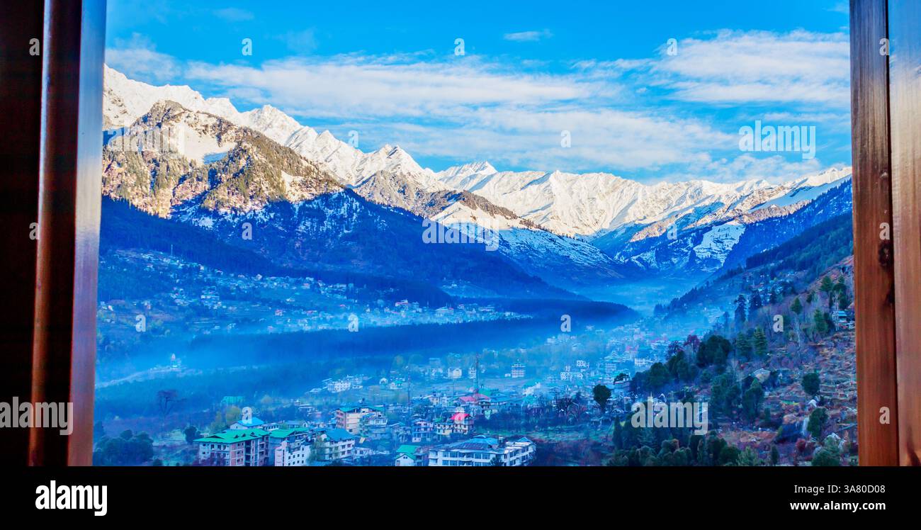 sunset in Manali overlooking Manali city and Himalayas India Stock ...
