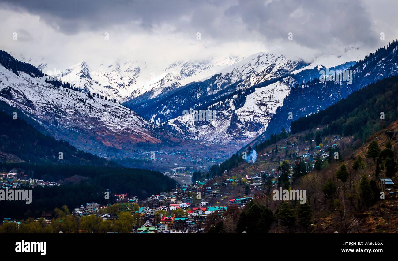 sunset in Manali overlooking Manali city and Himalayas India Stock ...