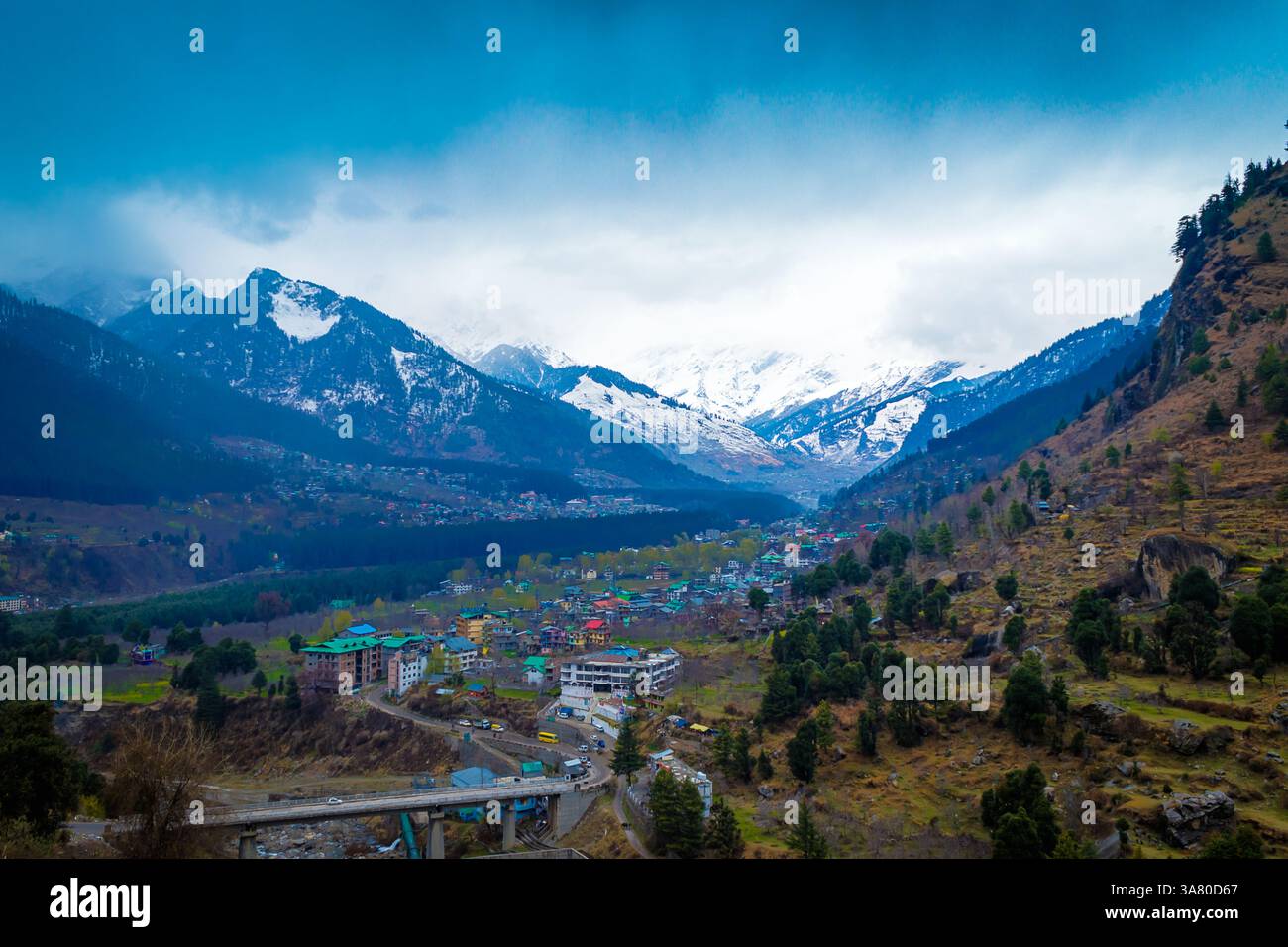 sunset in Manali overlooking Manali city and Himalayas India Stock ...