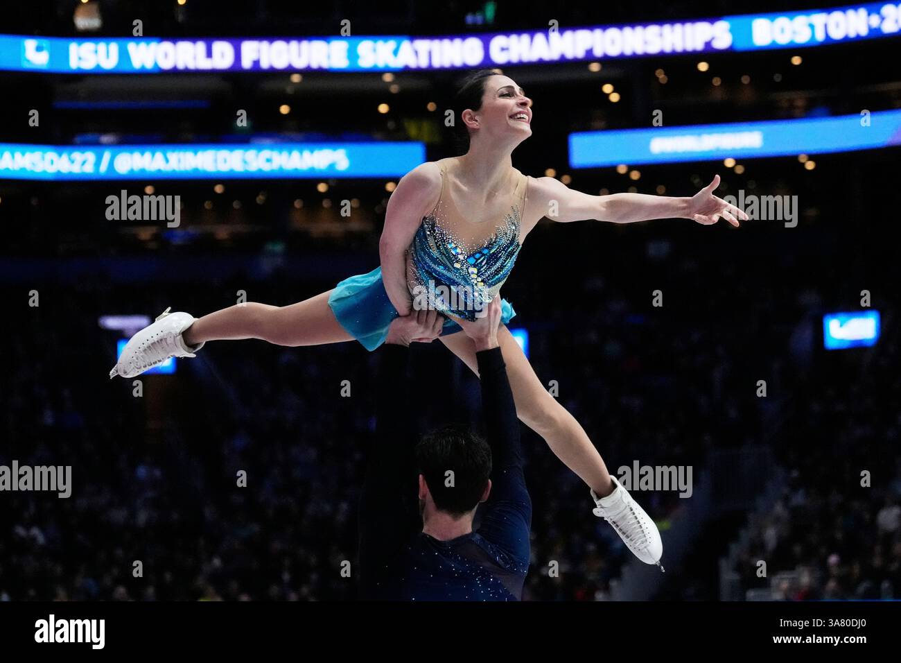 Deanna Stellato-Dudek and Maxime Deschamps, of Canada, perform during ...