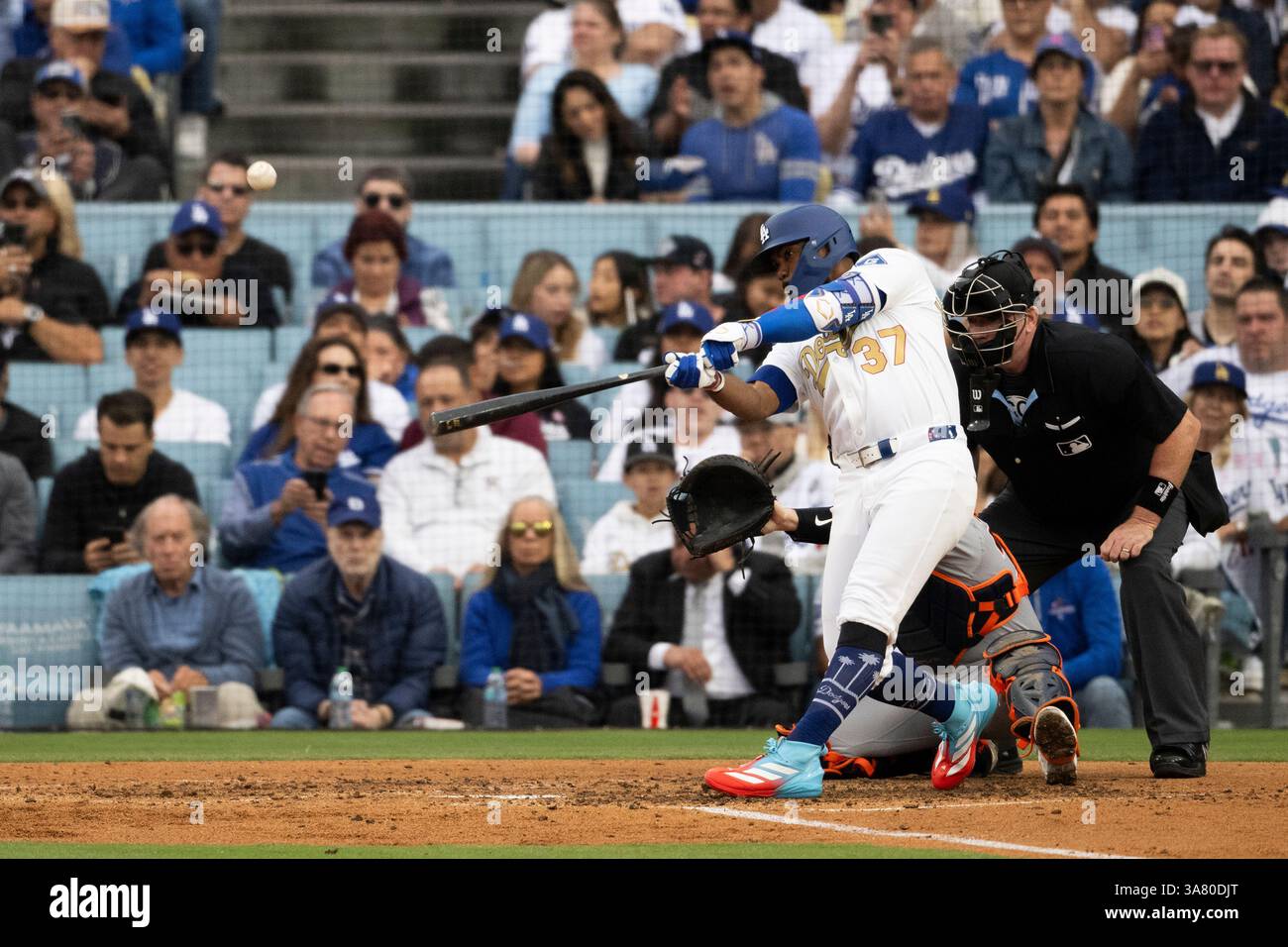 Los Angeles Dodgers' Teoscar Hernández (37) hits a three-run home run ...
