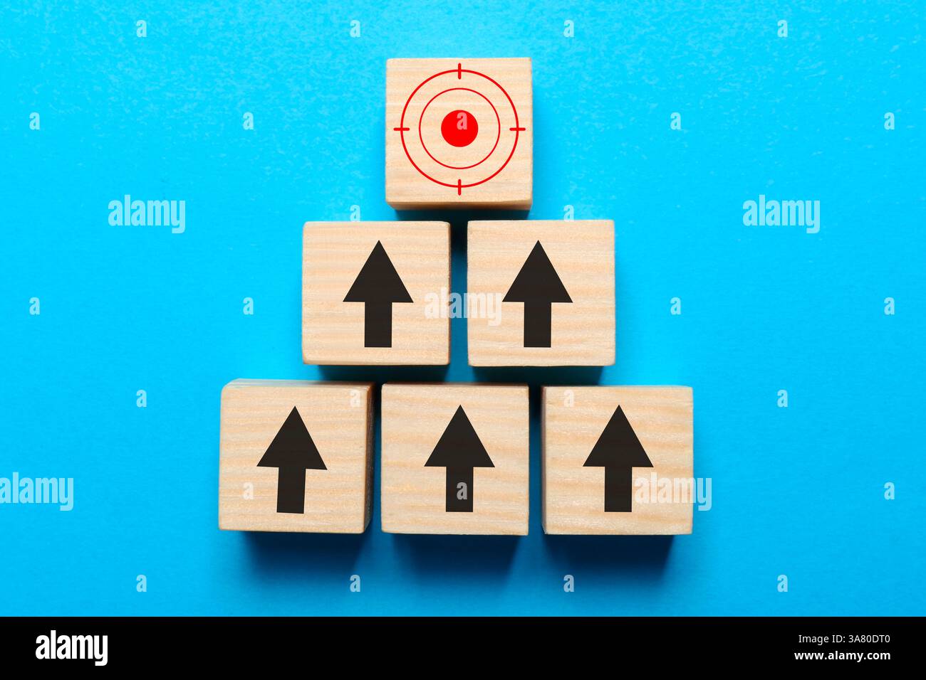 Targeting. Cubes with arrows pointing at one with bullseye on light ...