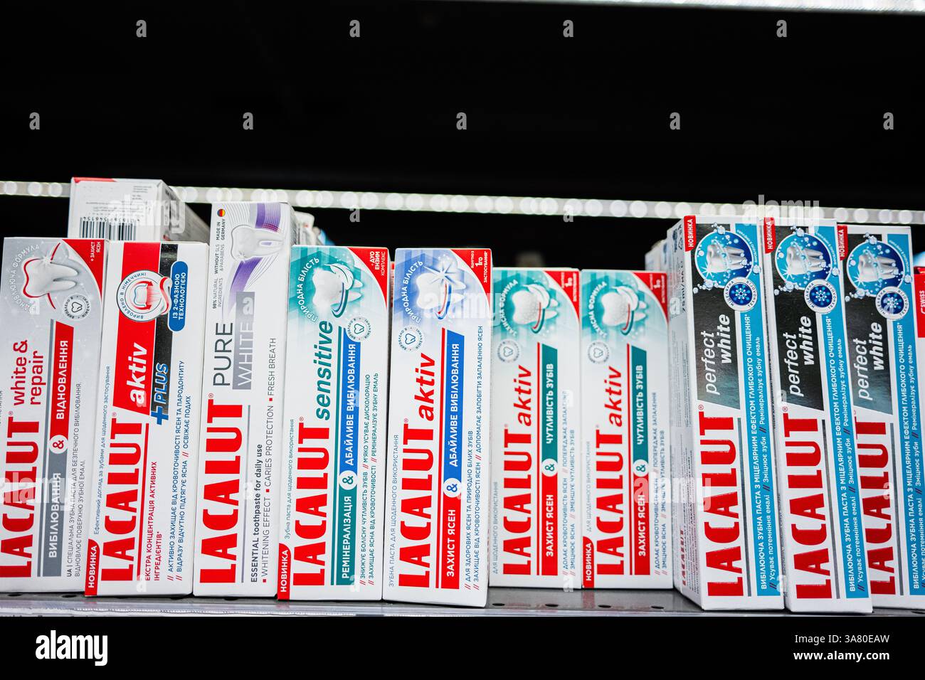 Lviv, Ukraine - March 25, 2025: Various Lacalut toothpaste products ...