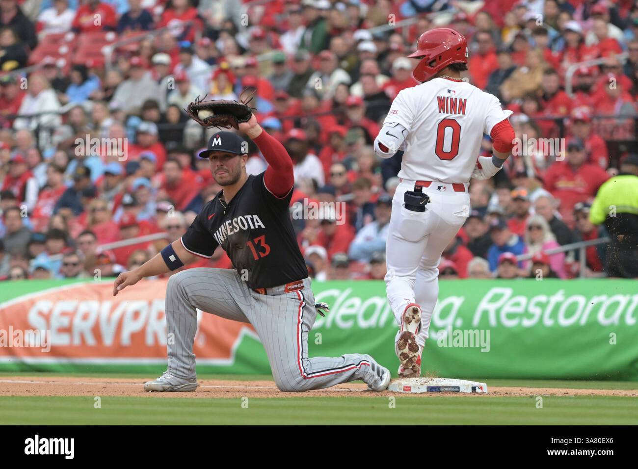 Minnesota Twins' Ty France (13) makes an out against St. Louis ...