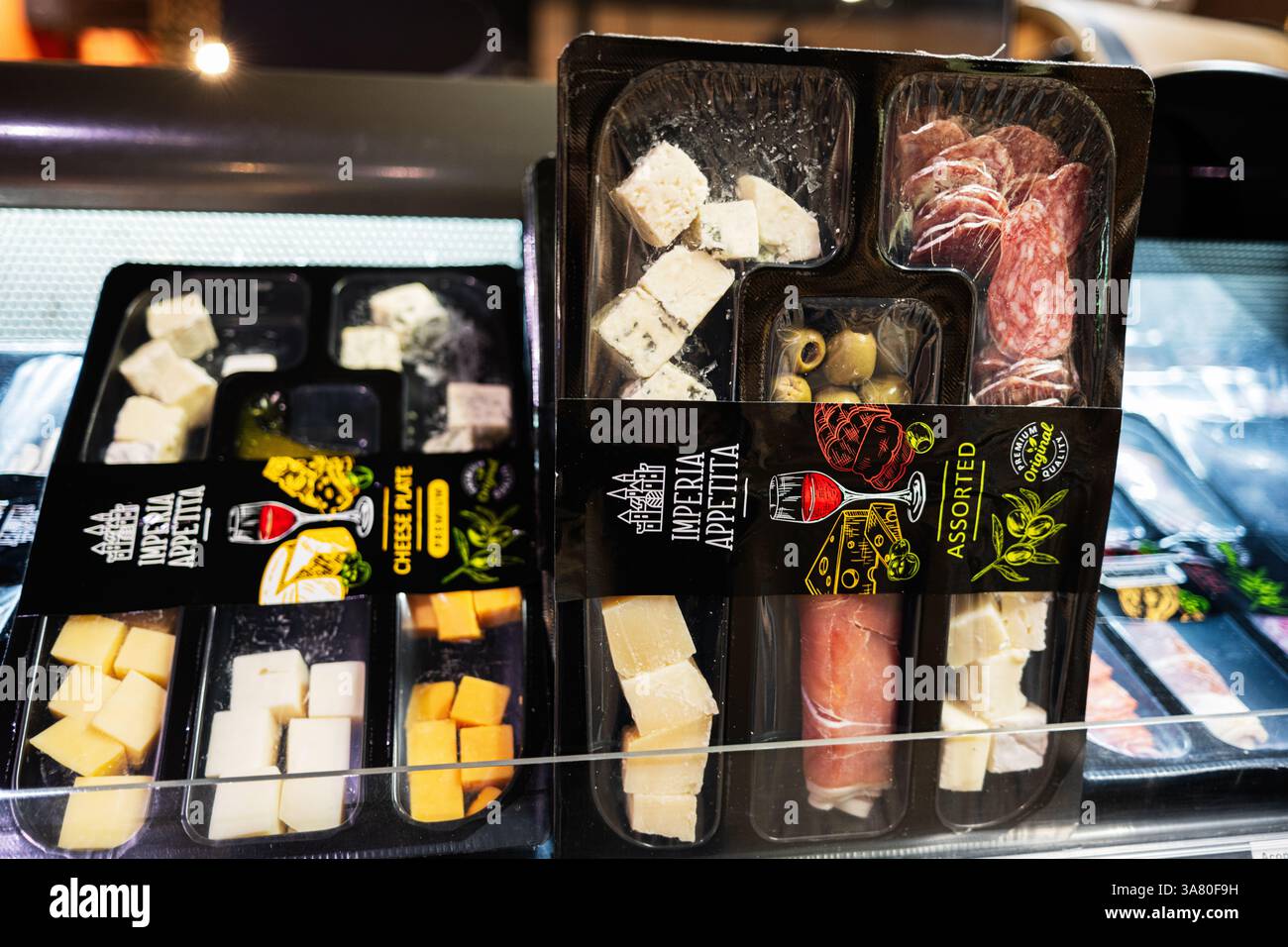 Lviv, Ukraine - March 25, 2025: Cheese and meat selection packs from ...