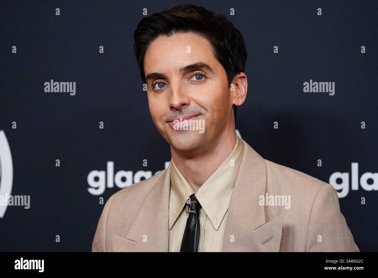 Paul W. Downs arrives at the 36th annual GLAAD Media Awards on Thursday ...