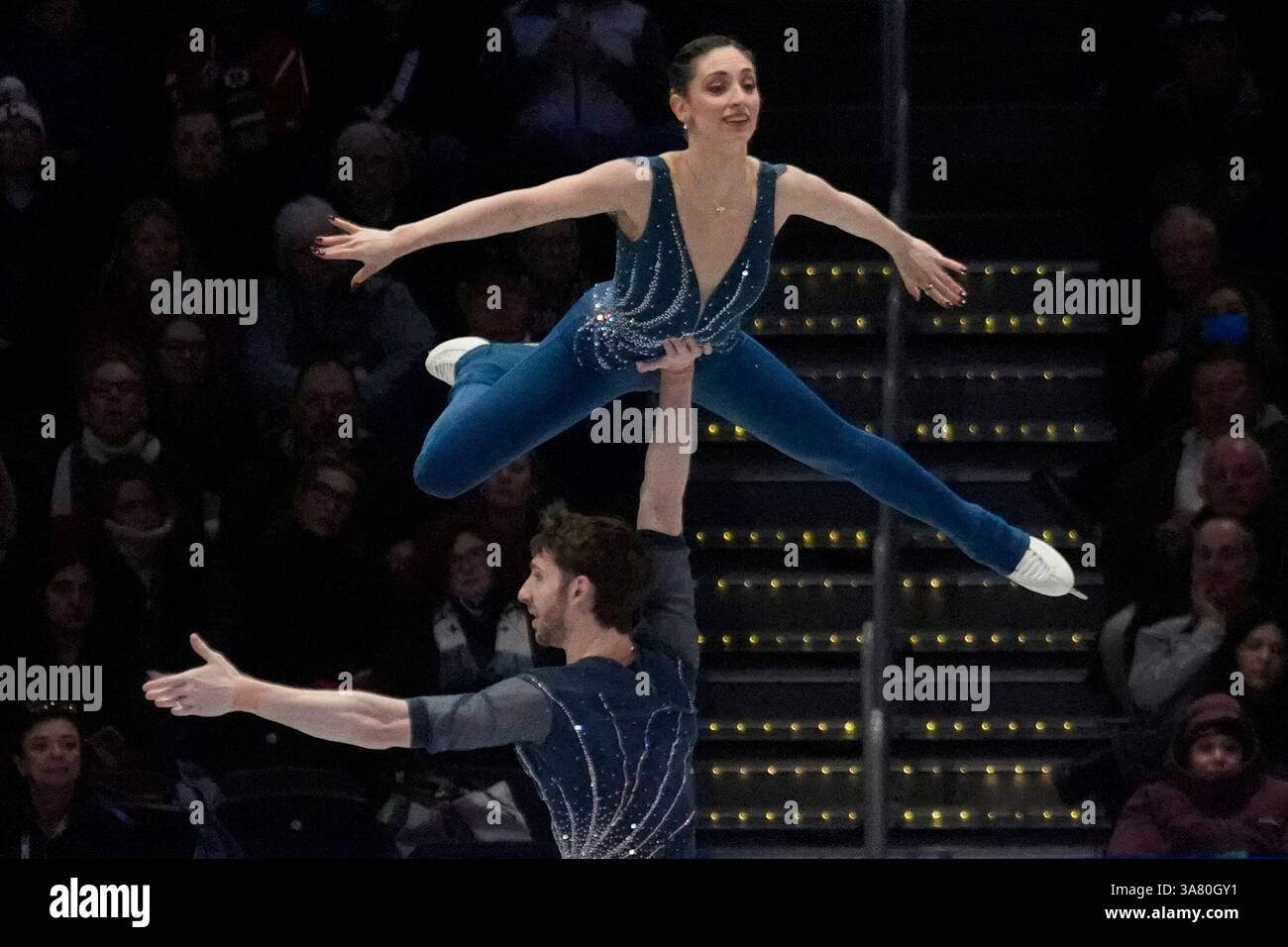 Sara Conti and Niccolo Macii, of Italy, perform during the pairs free ...