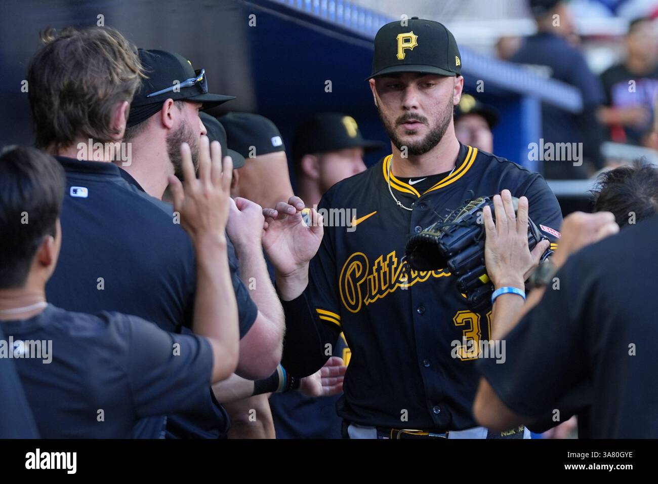 Pittsburgh Pirates pitcher Paul Skenes is high-fived in the dugout ...