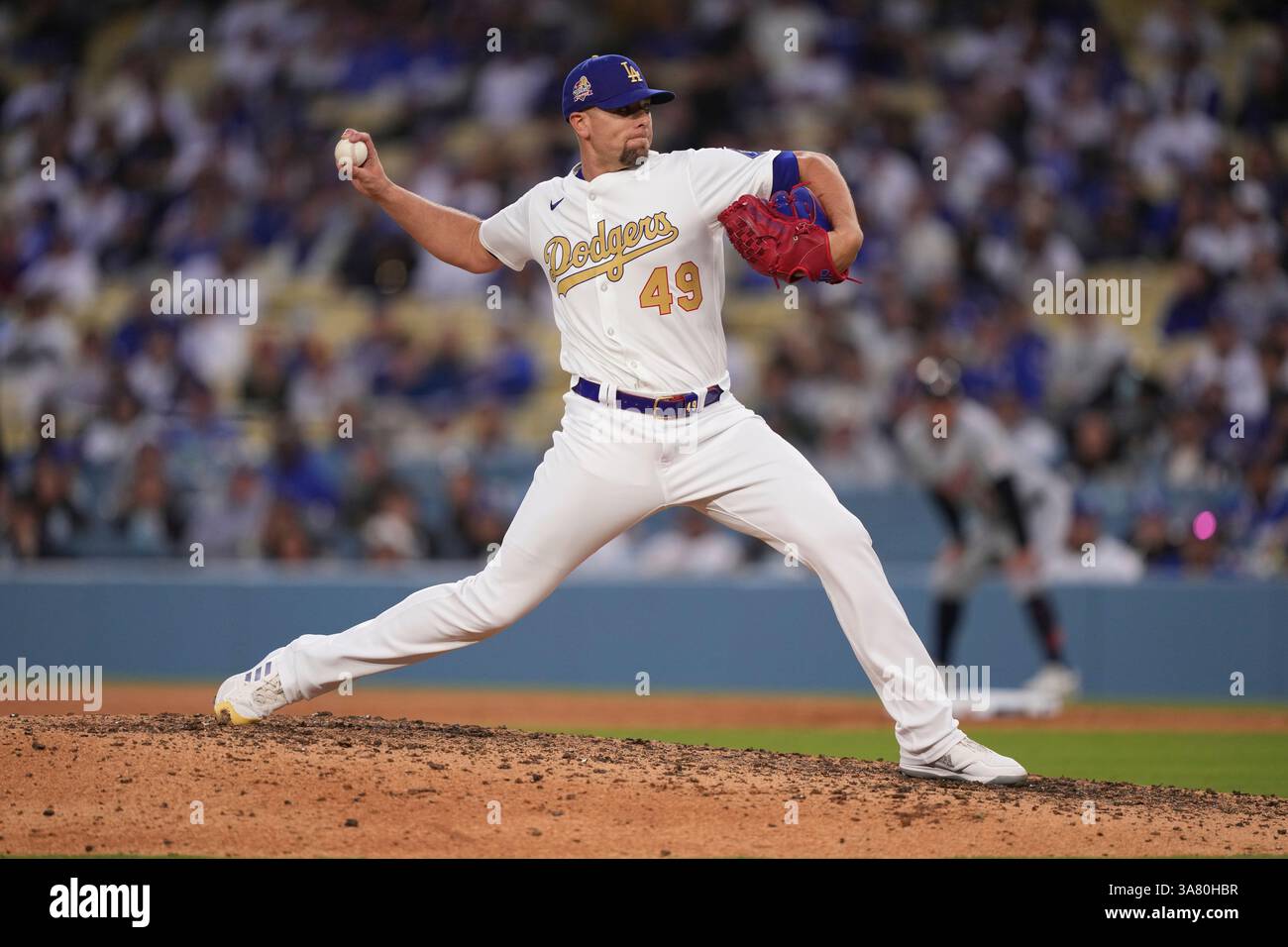 Los Angeles Dodgers pitcher Blake Treinen throws to the plate during ...
