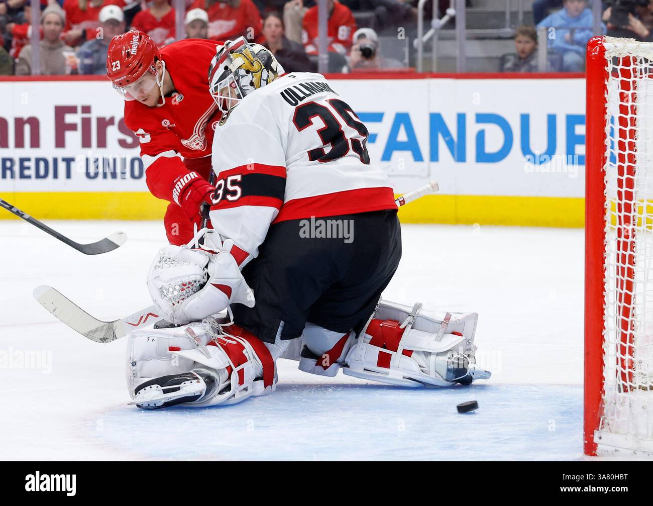 Detroit Red Wings left wing Lucas Raymond, left, scores against Ottawa ...