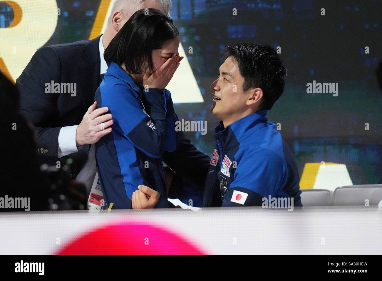 Riku Miura and Ryuichi Kihara, of Japan, react after the pairs free ...