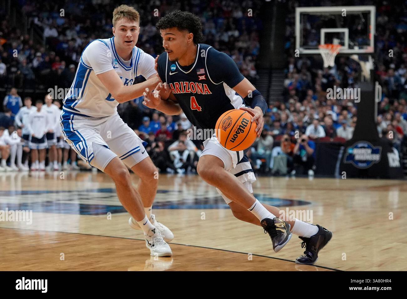 Arizona forward Trey Townsend (4) drives against Duke forward Cooper ...