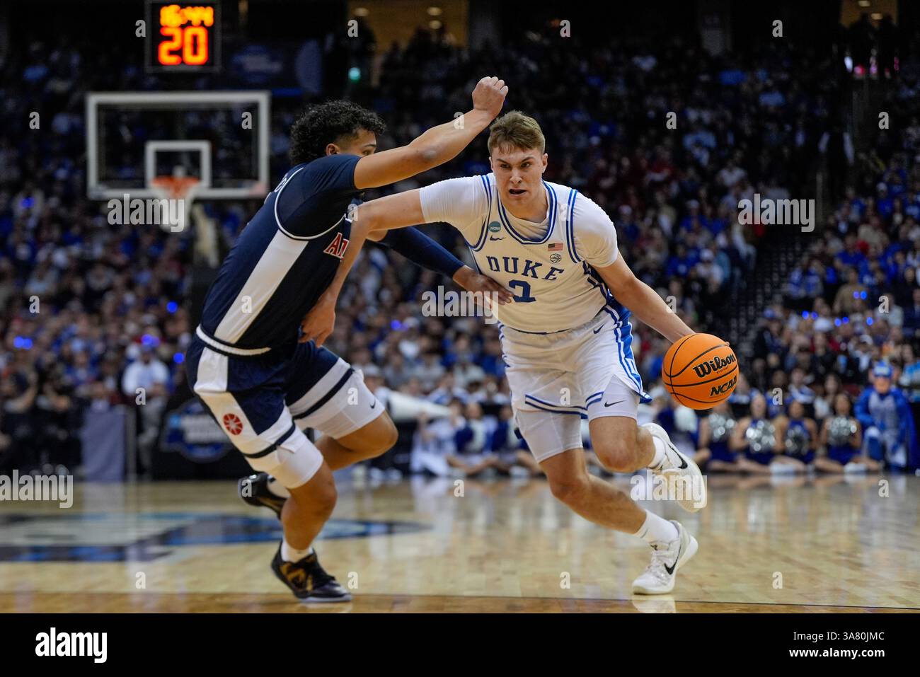 Duke forward Cooper Flagg (2) drives against Arizona forward Trey ...