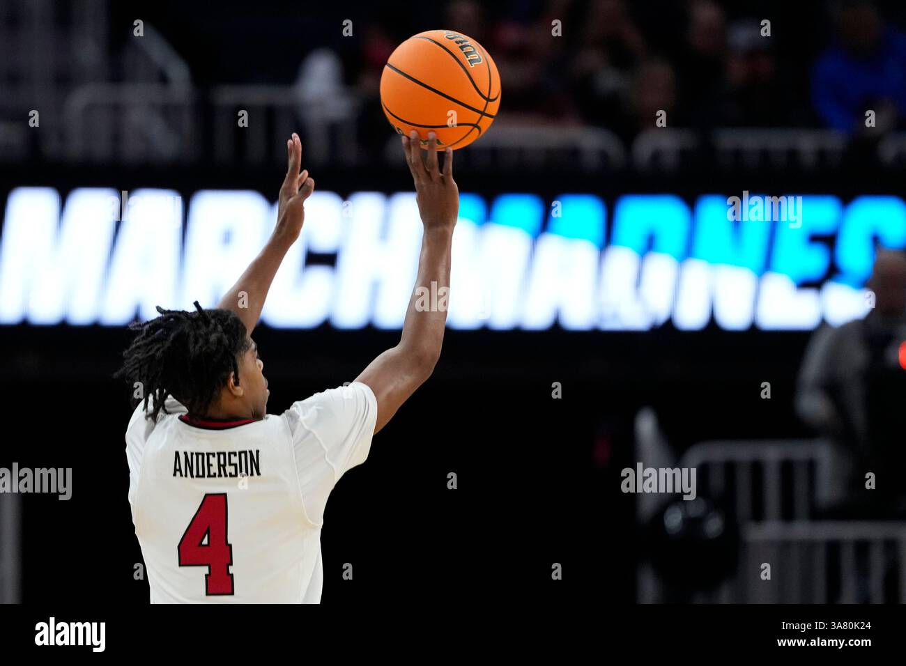 Texas Tech guard Christian Anderson (4) shoots during the first half in the Sweet 16 of the NCAA ...