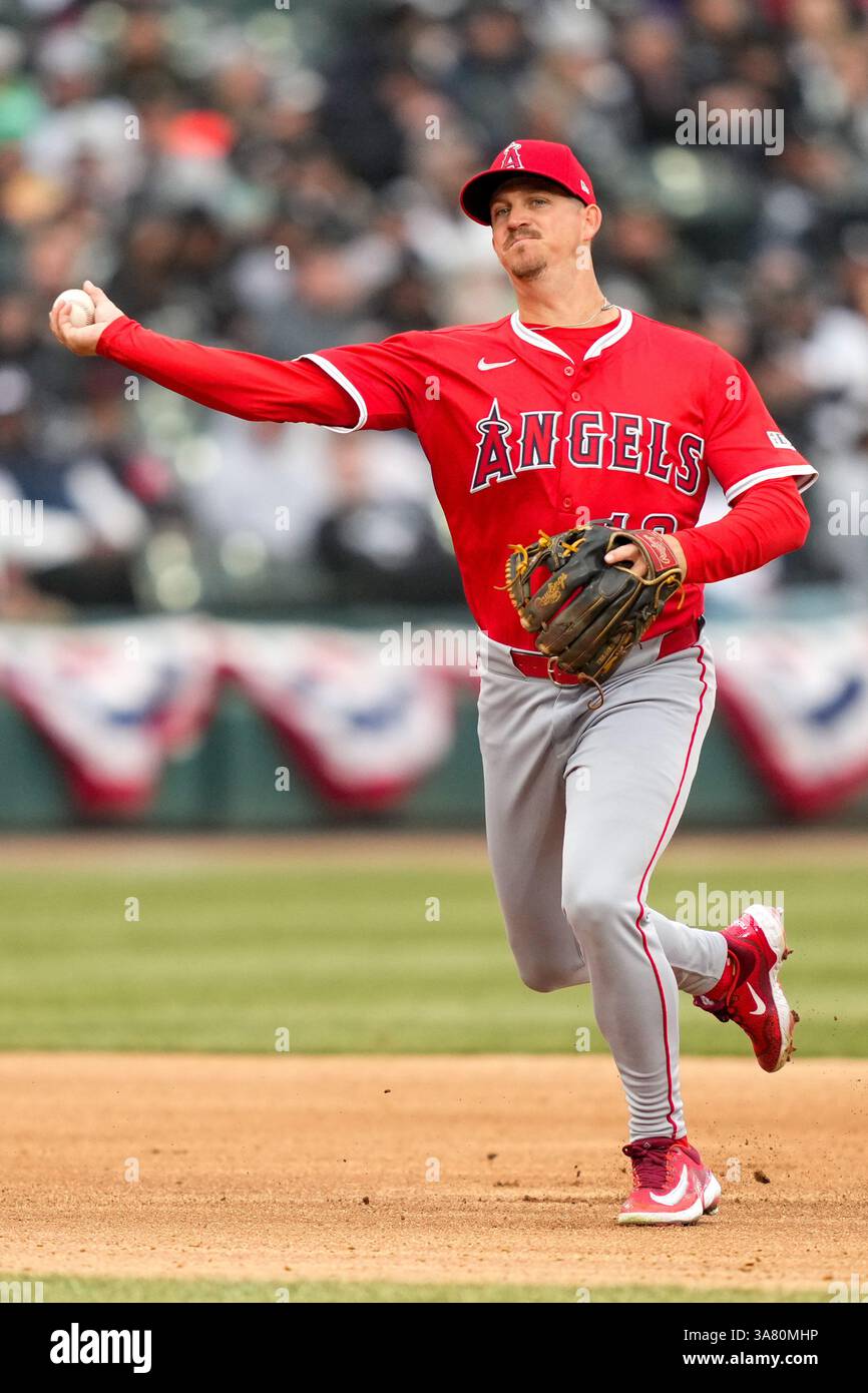 Los Angeles Angels shortstop Kevin Newman (10) tosses the ball during a ...