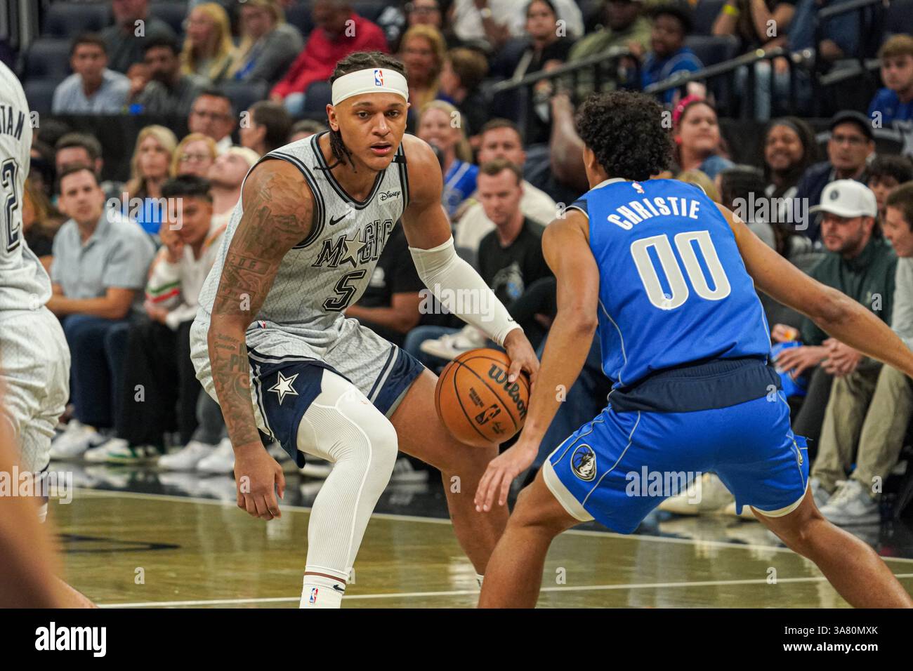 Orlando, Florida, USA, March 27, 2025, Orlando Magic forward Paola Banchero #5 attempt to run ...