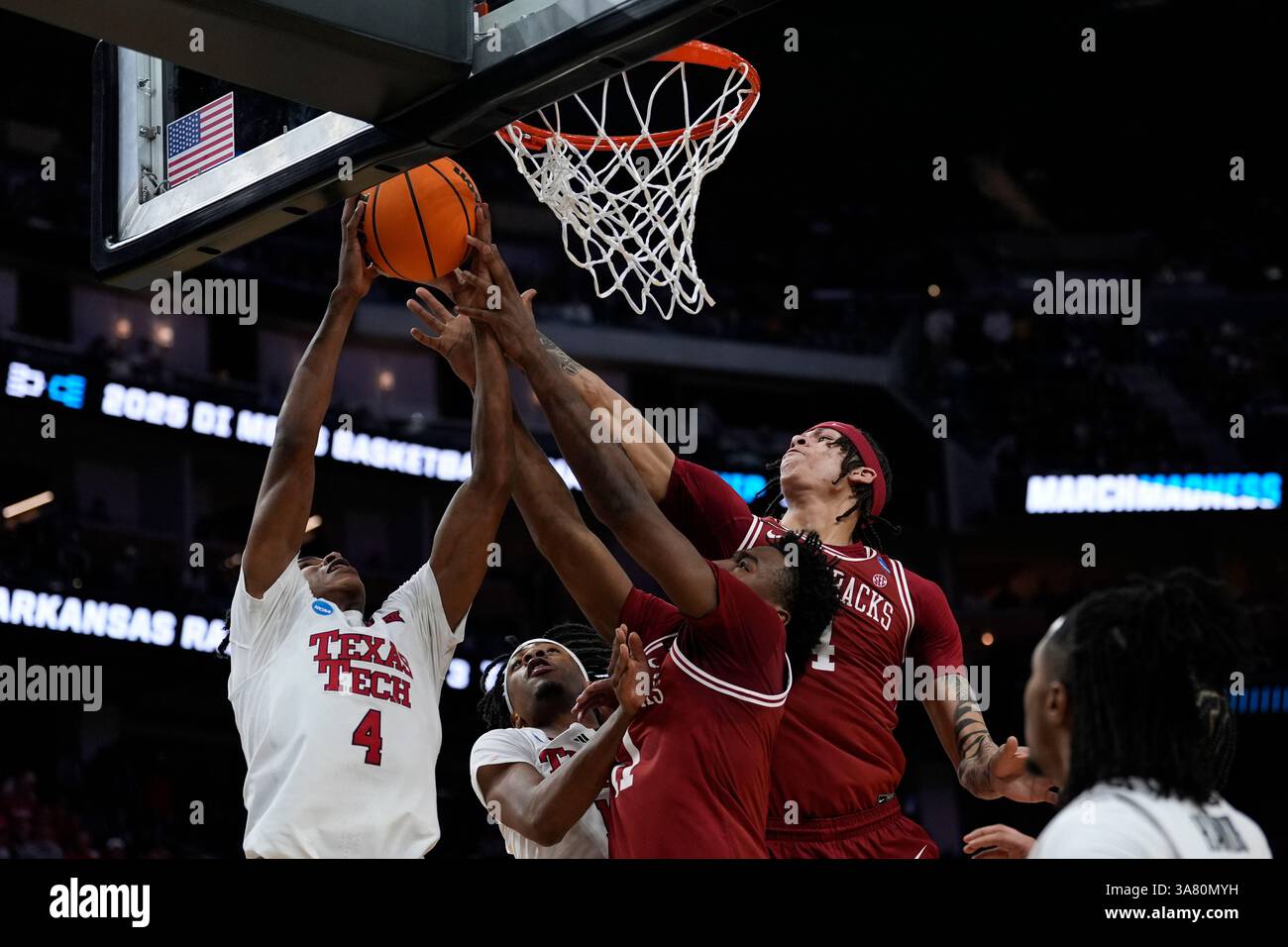 Texas Tech guard Christian Anderson (4), Arkansas forward Karter Knox ...