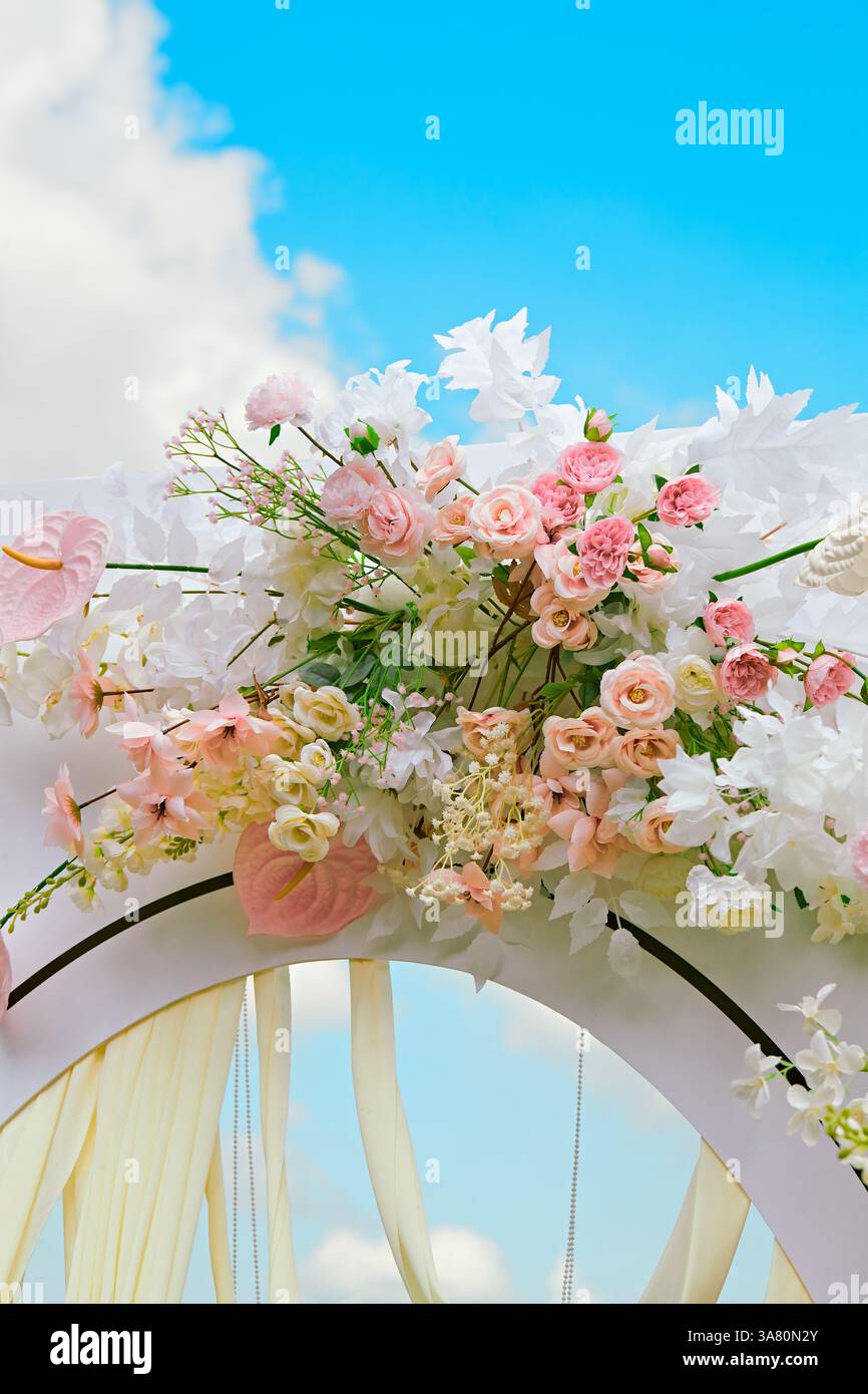 Wedding Arch with Floral Decorations Stock Photo - Alamy