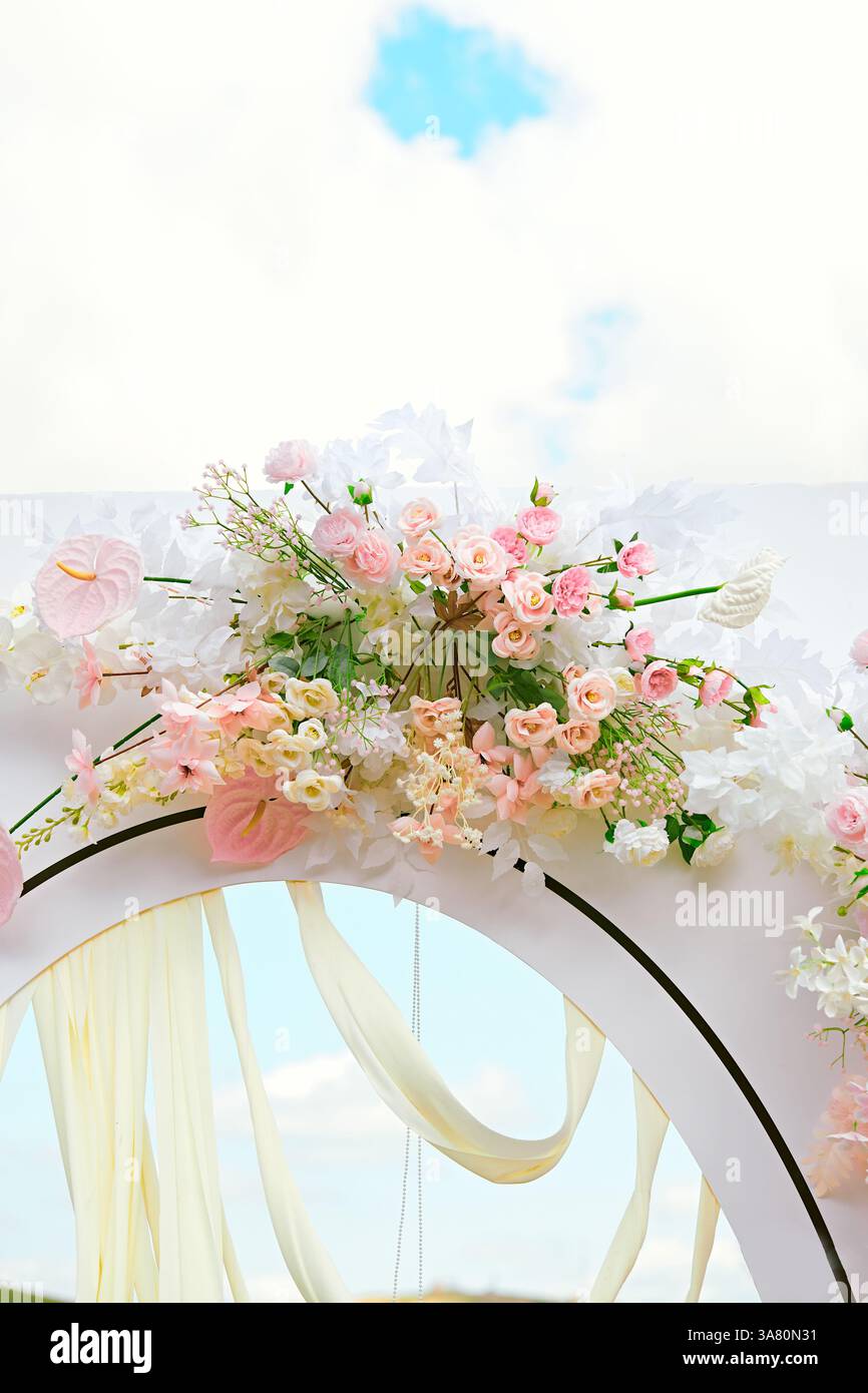 Wedding Arch with Floral Decorations Stock Photo - Alamy